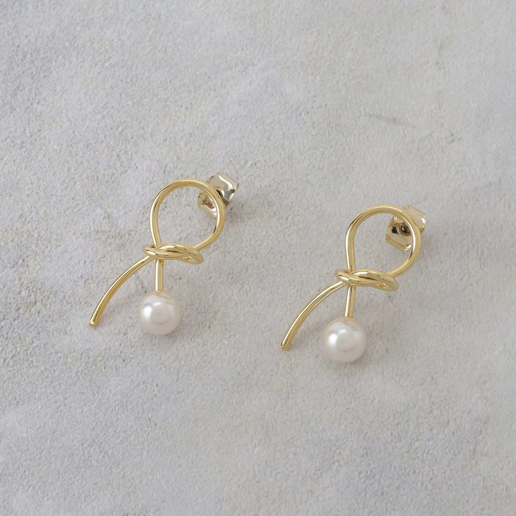 OPAQUE.CLIP Twisted Metal Fake Pearl Earrings